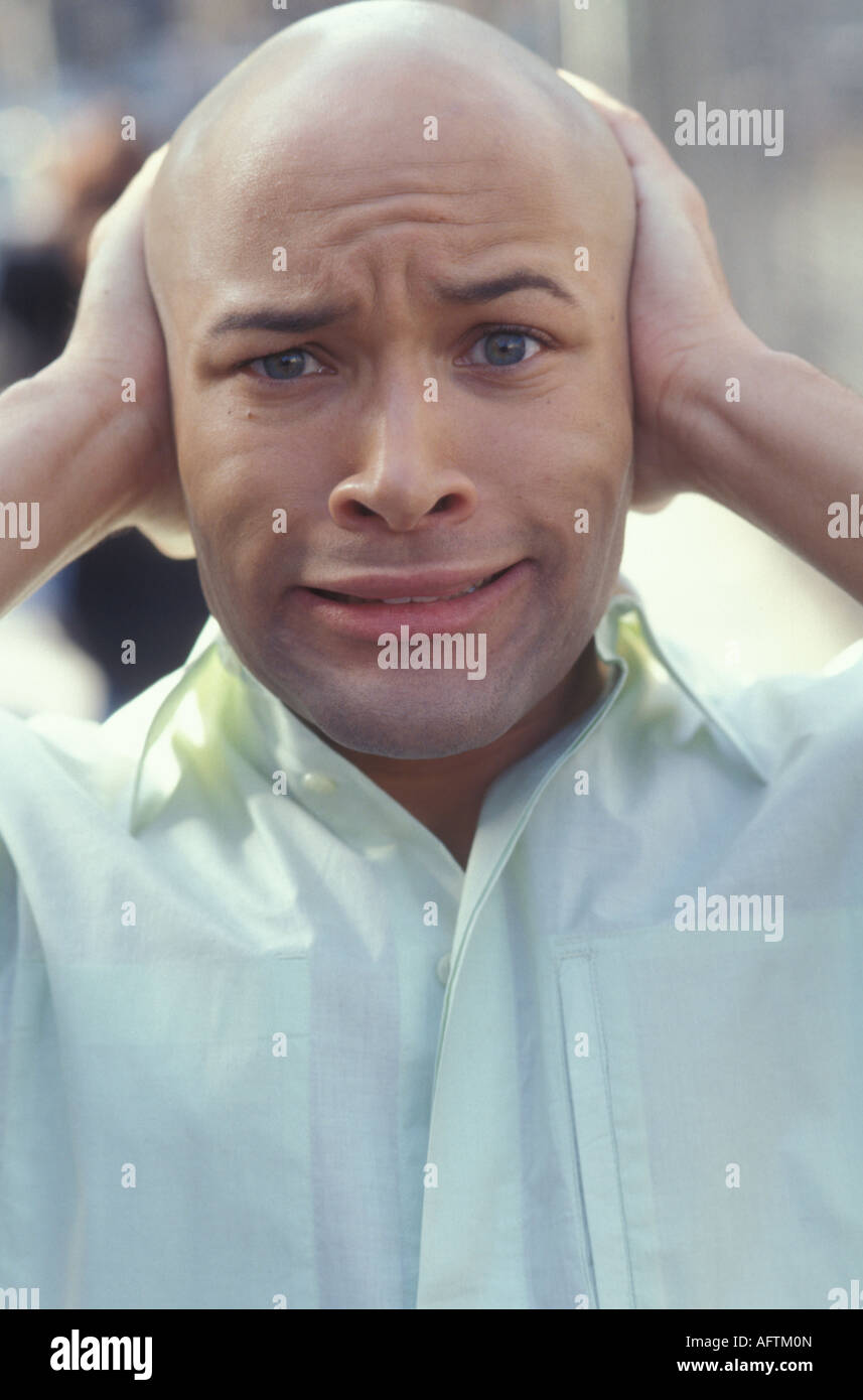 Young man screaming Stock Photo - Alamy