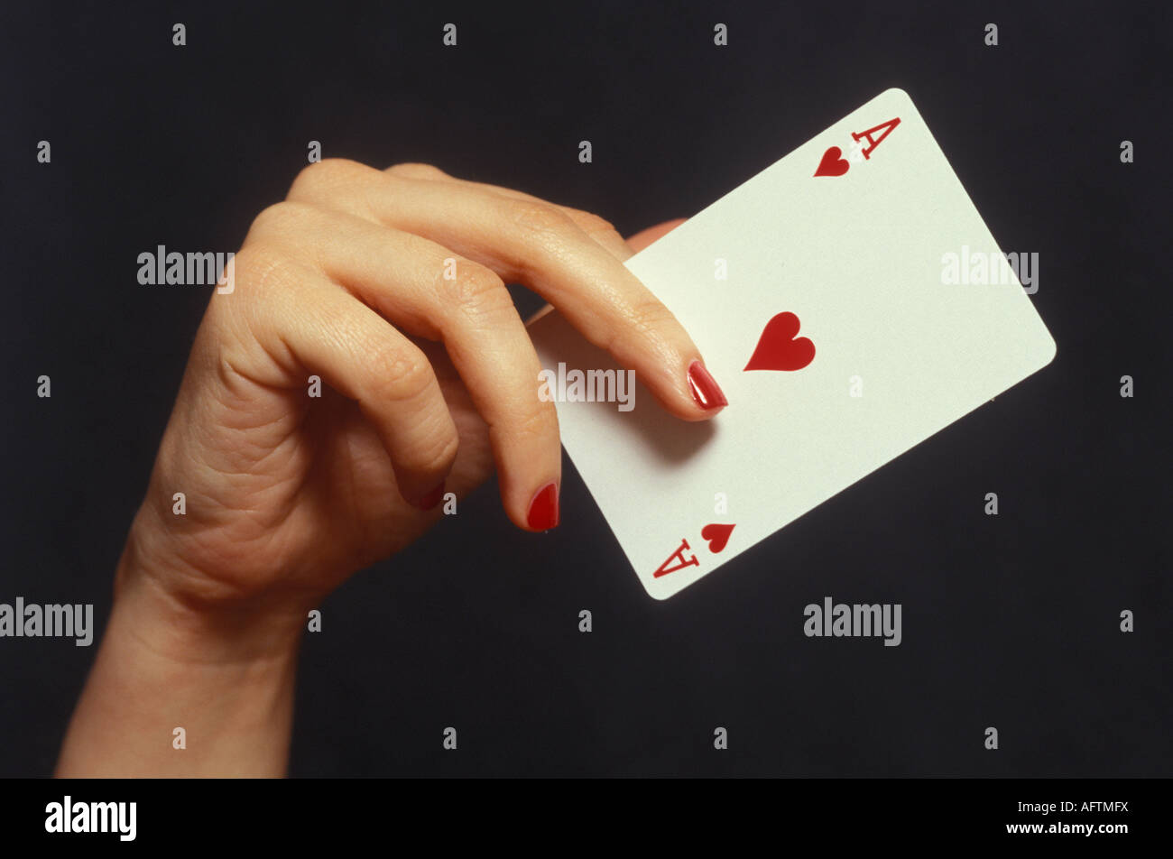 Hand showing playing cards, close up Stock Photo - Alamy