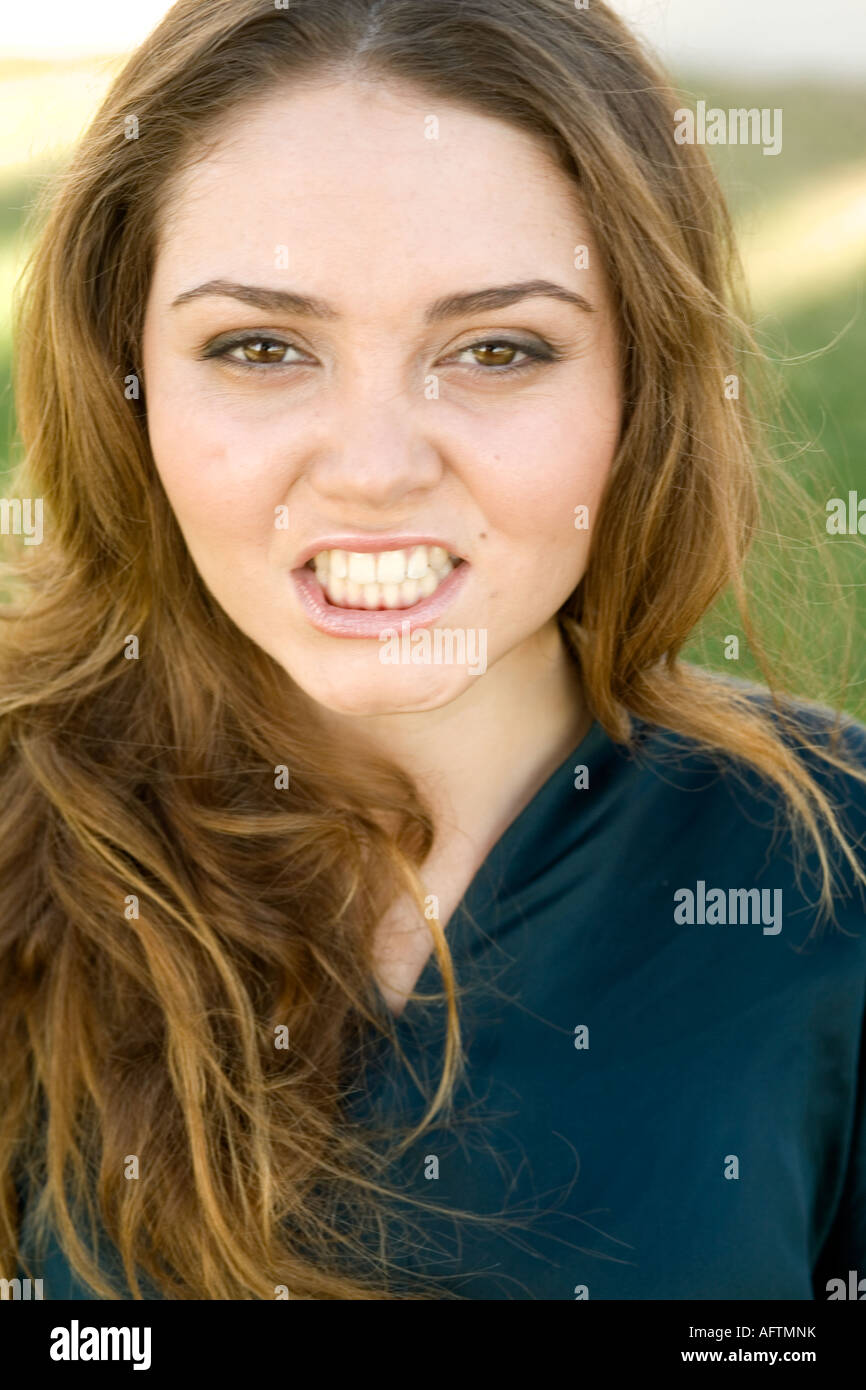 Young woman staring, close up, portrait Stock Photo - Alamy