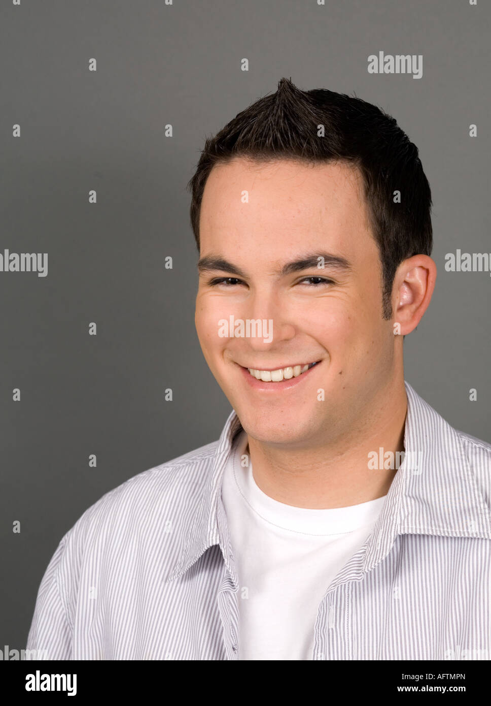 Young man smiling, close up, portrait Stock Photo - Alamy