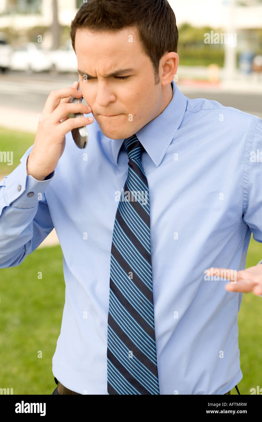 Young man using mobile phone, close up Stock Photo - Alamy