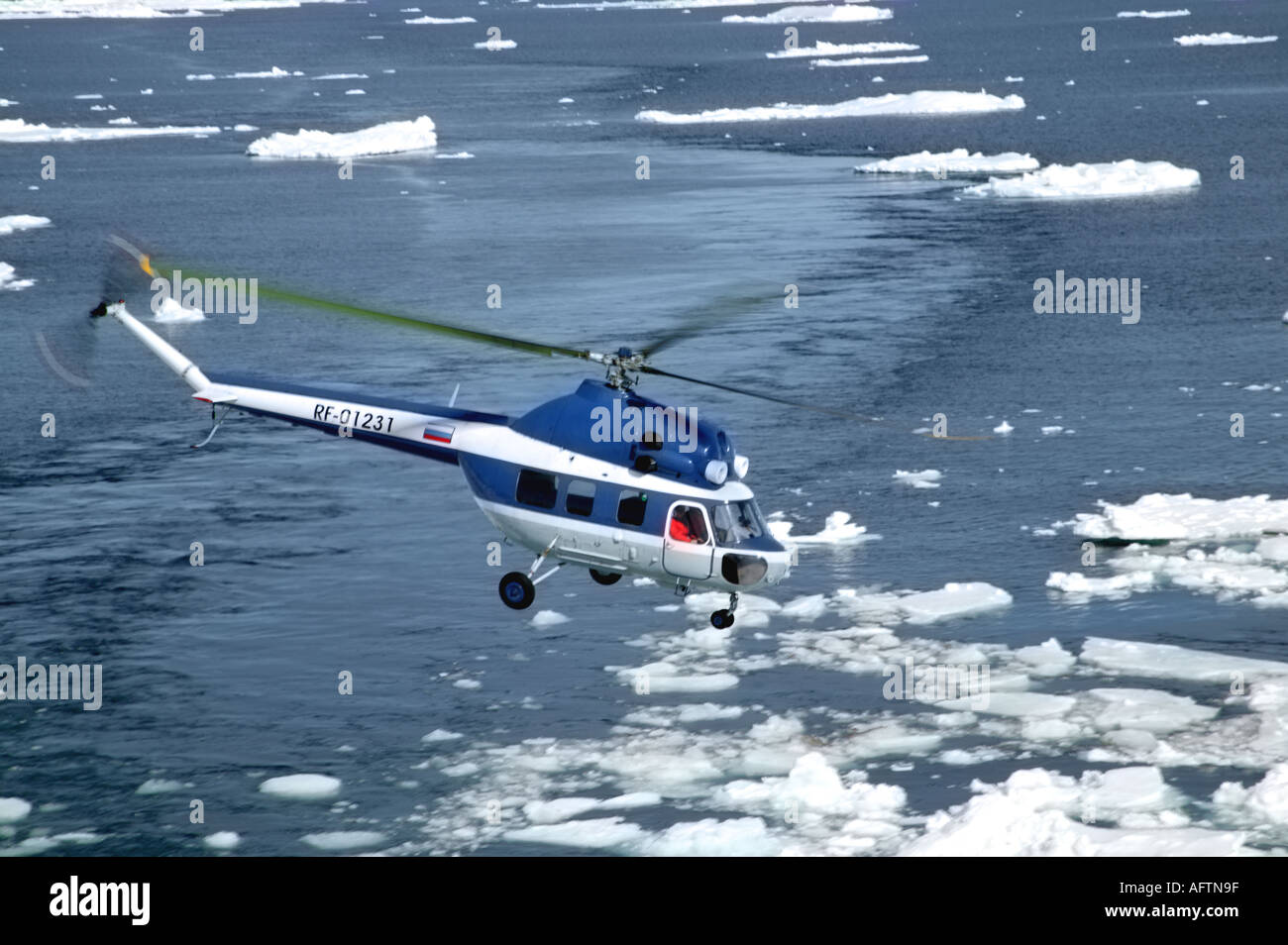 Russian helicopter flying over frozen sea Weddell Sea Antarctica Stock ...