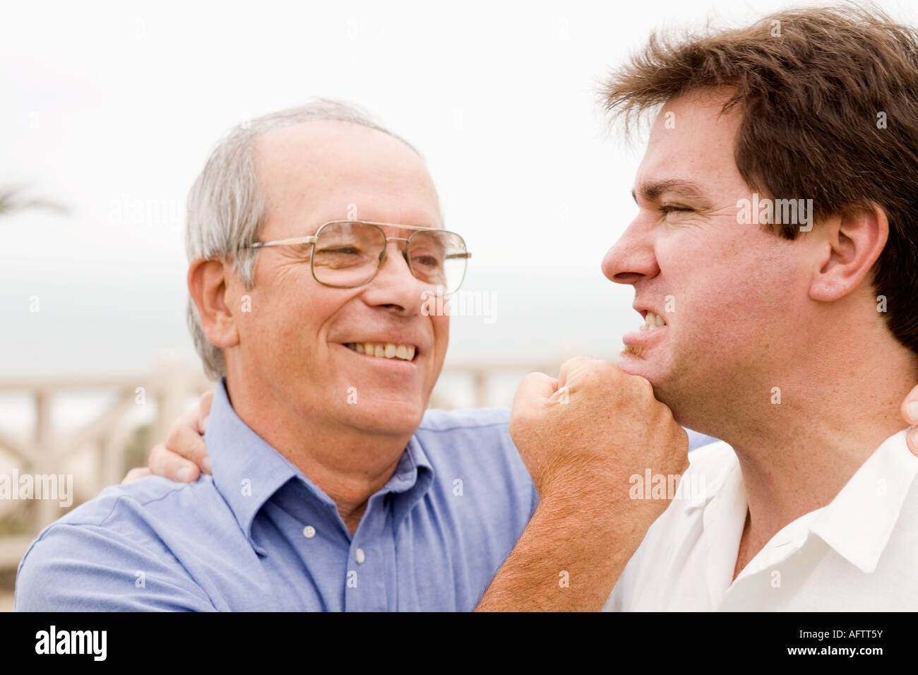 Son and older father skin hi-res stock photography and images - Alamy