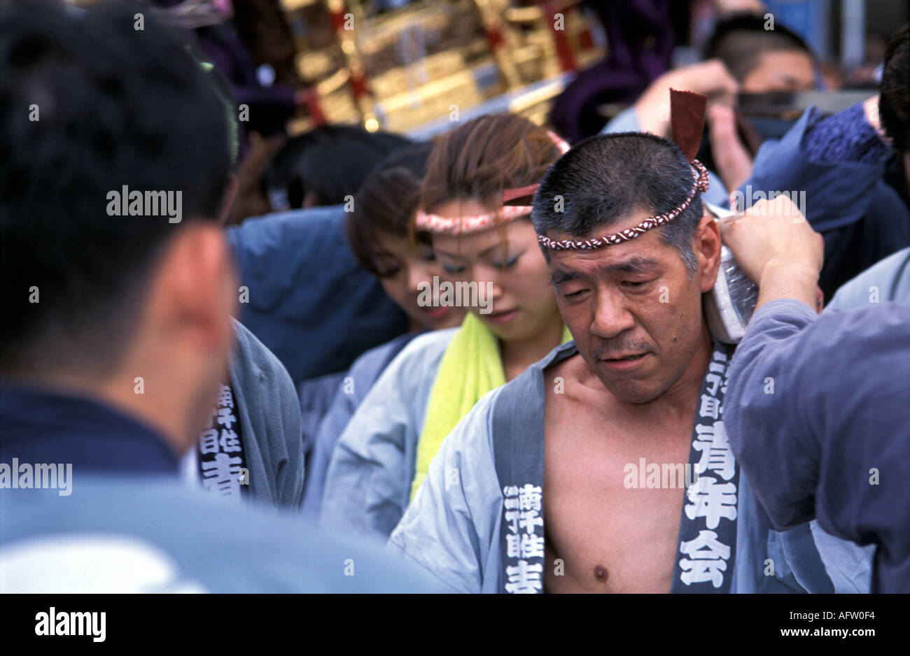 Carrying a mikoshi hi-res stock photography and images - Alamy