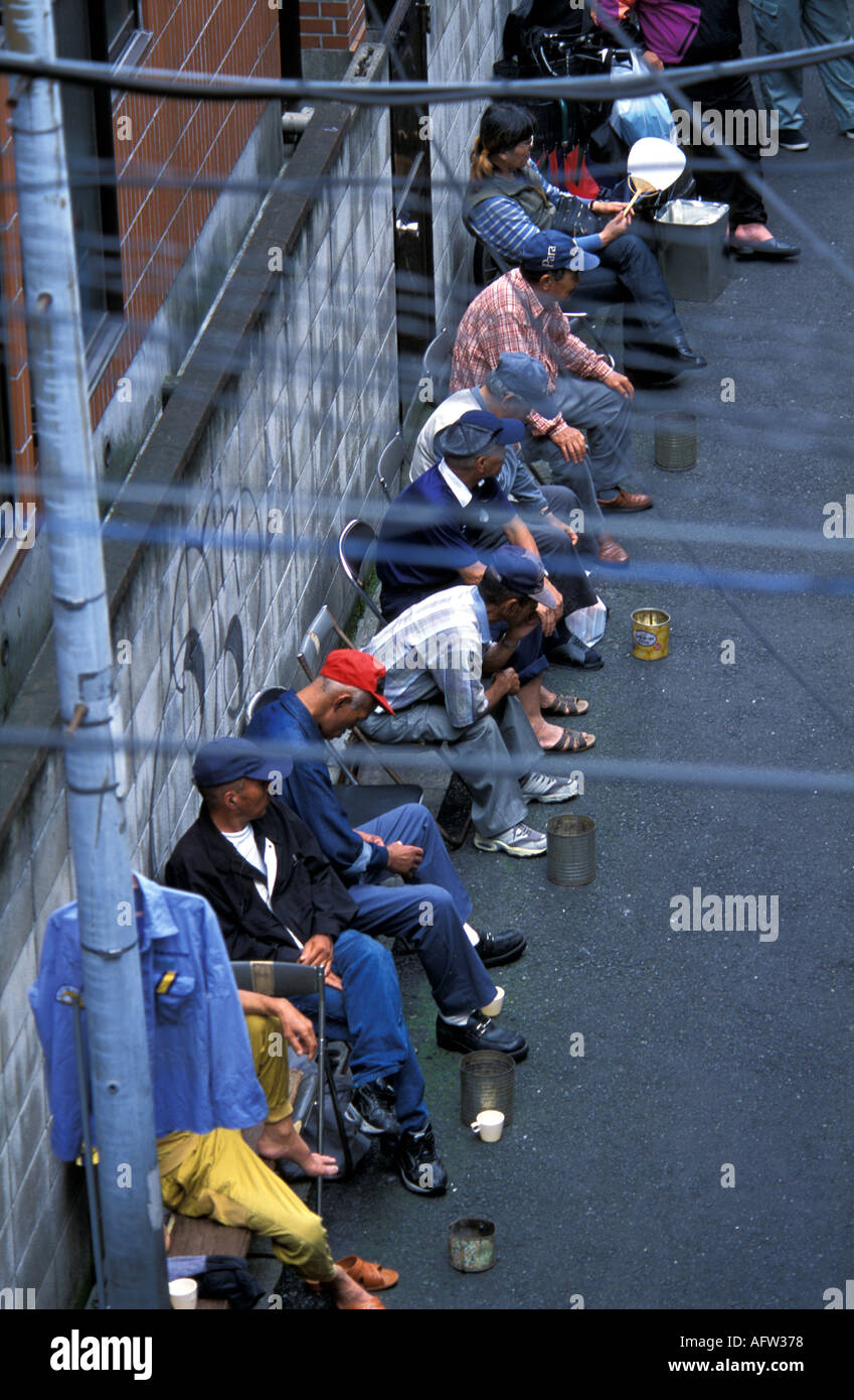 Japanese homeless people on the streets of Tokyo Japan Stock Photo - Alamy
