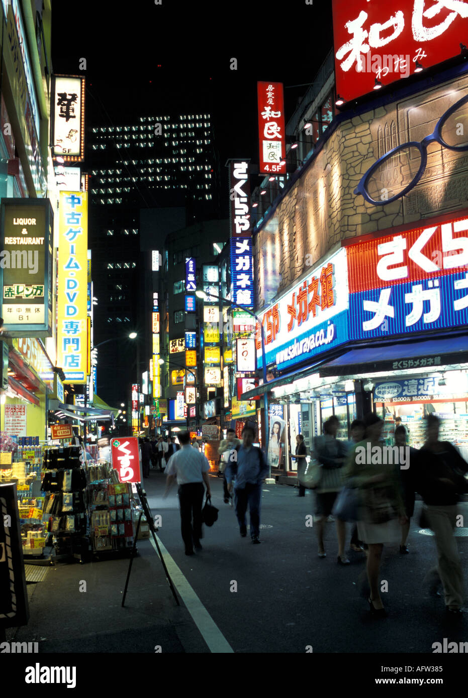 Shinjuku shopping district at night Tokyo Japan Stock Photo - Alamy