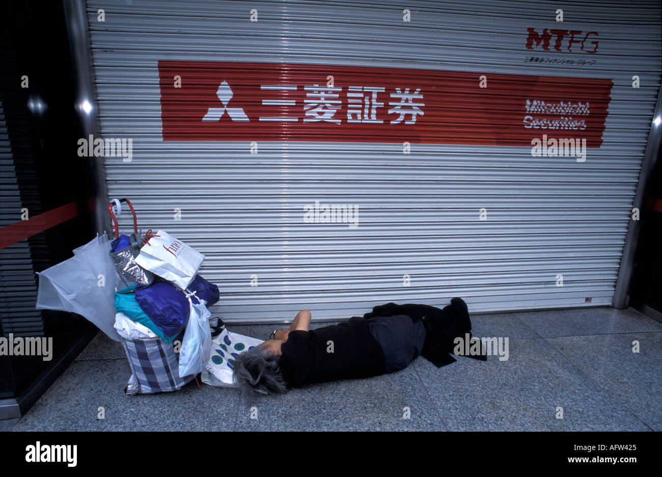 Japanese homeless sleeping on the street Tokyo Japan Stock Photo - Alamy