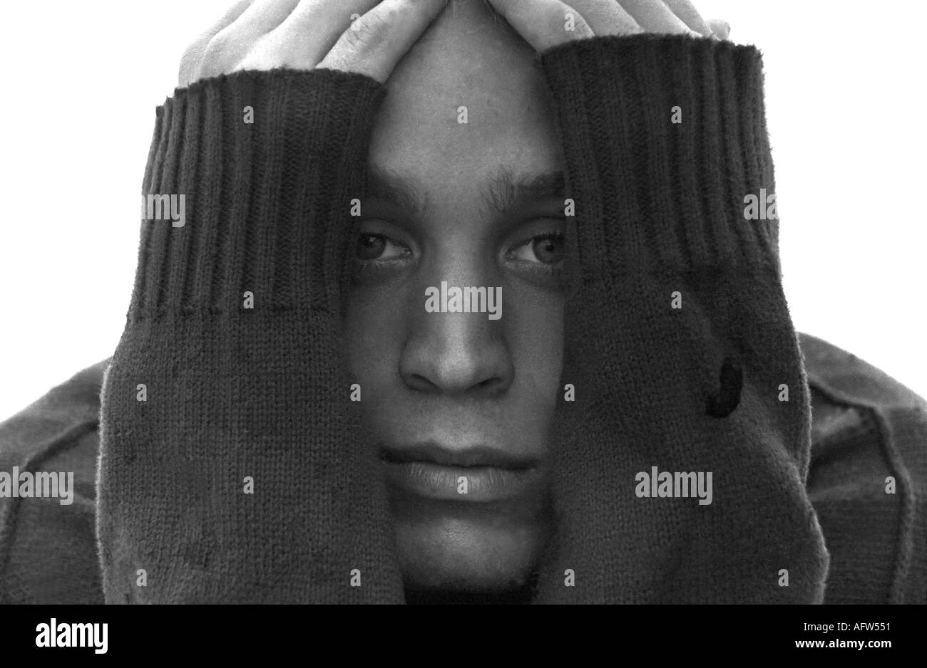 Man with head in his hands Stock Photo - Alamy