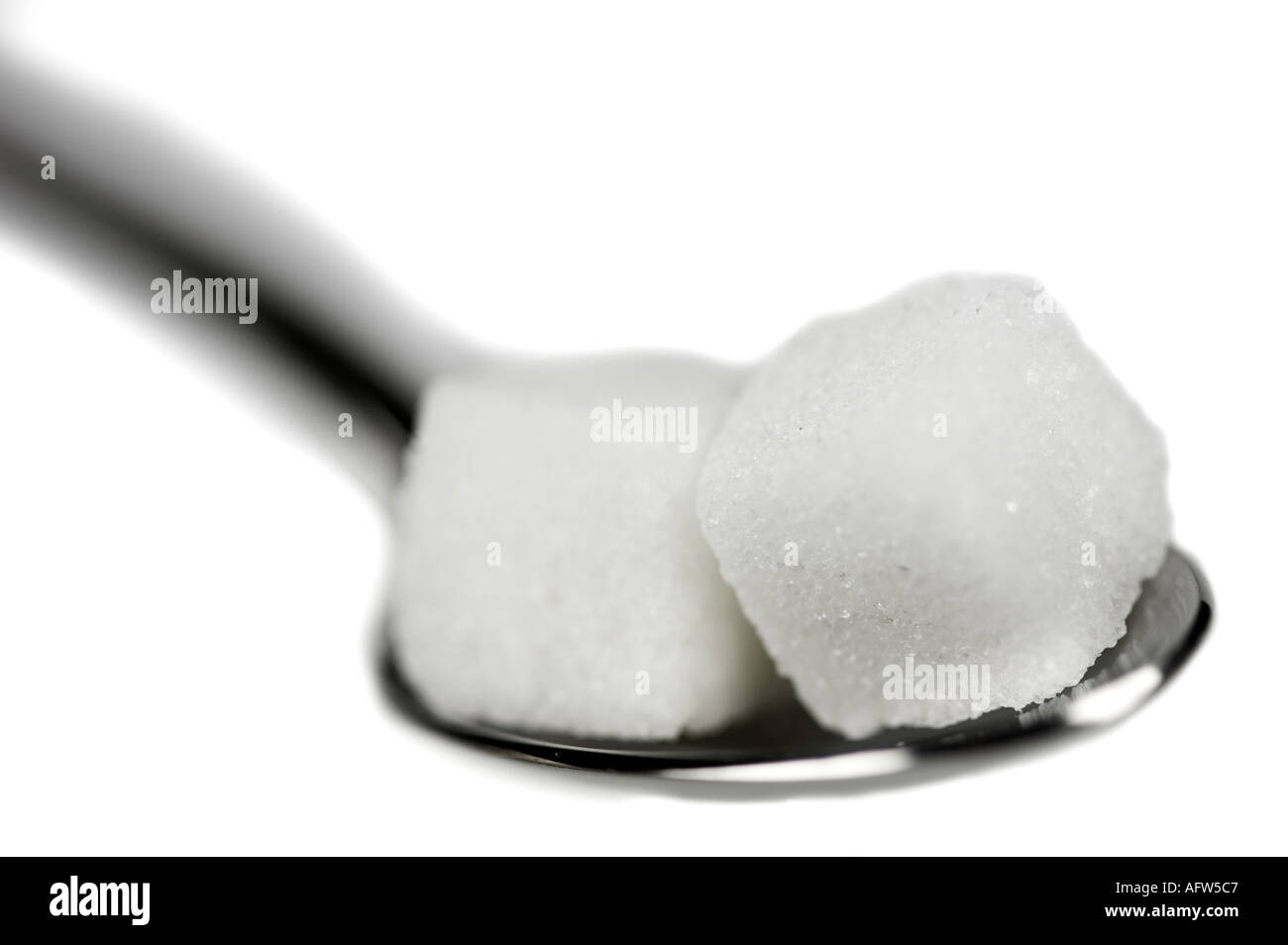Sweetener Concept two lumps Stock Photo - Alamy