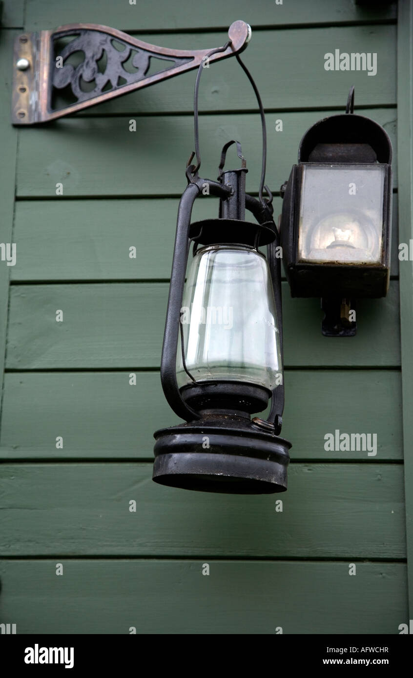 An oil lamp and a coach lamp Stock Photo - Alamy