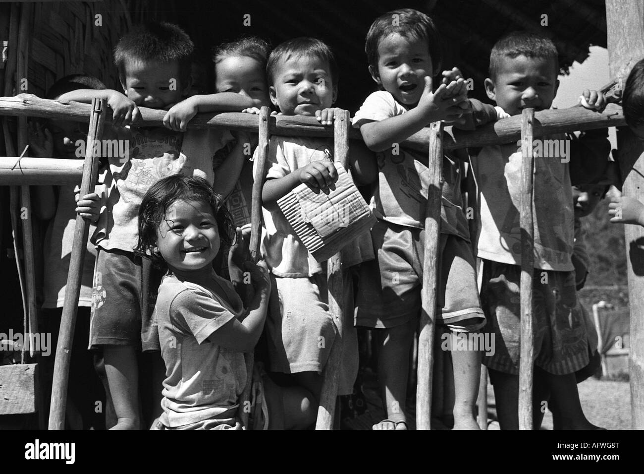 Poor children smiling Black and White Stock Photos & Images - Alamy