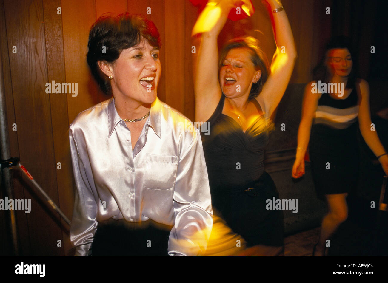 Woman dancing in a nightclub hi-res stock photography and images - Alamy