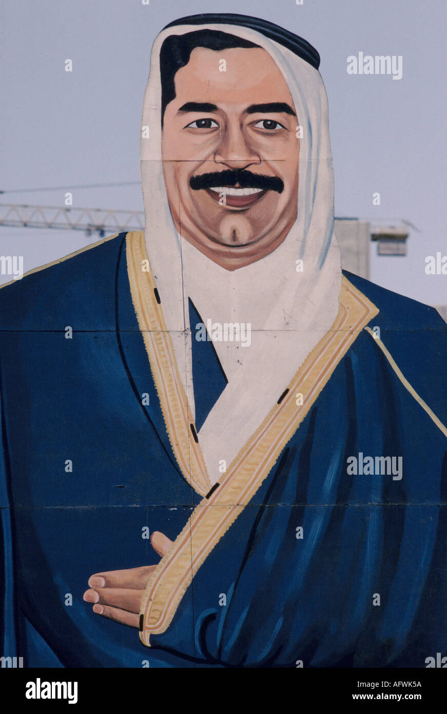 Saddam Hussein portrait Liberty Square in traditional arab clothing ...
