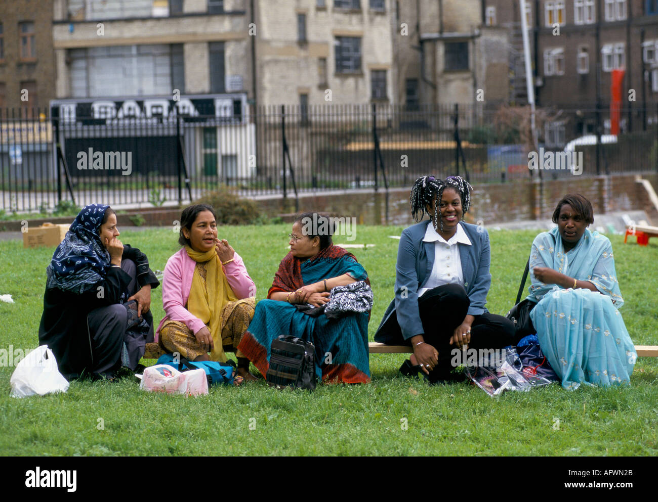 Bangladeshi community east London women sitting down and chatting in ...
