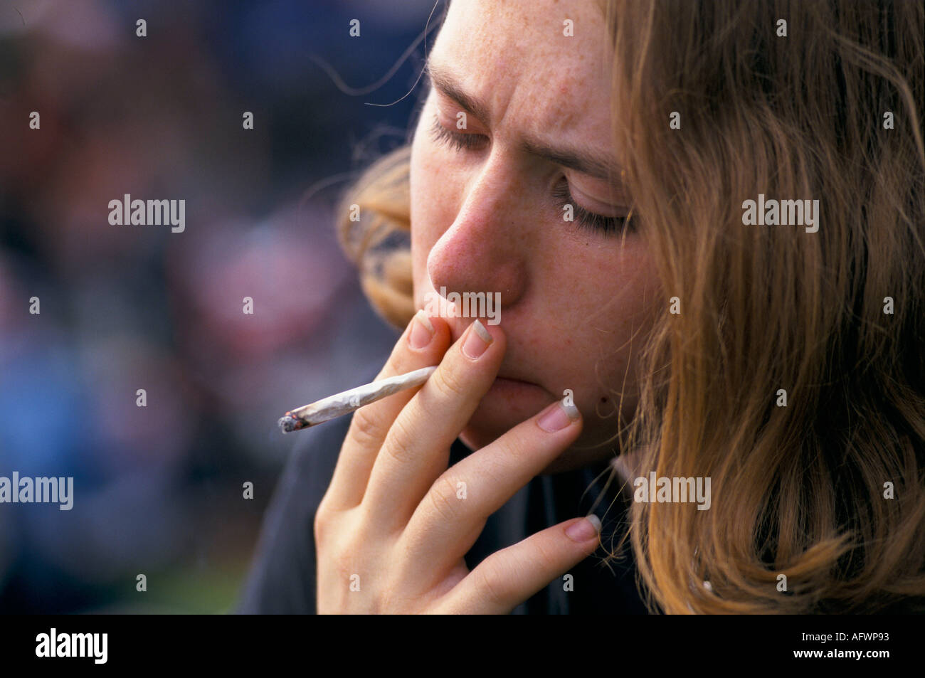 Cannabis smoking marijuana weed at a demo to legalise the drug. Teen ...