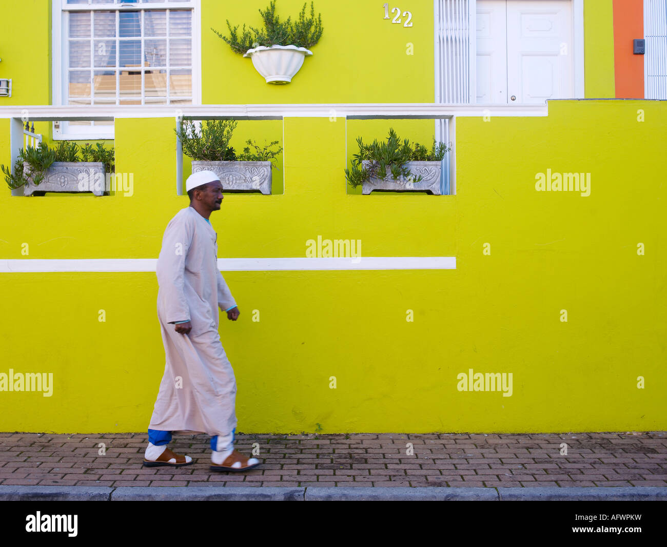 Muslim man walking through the Muslim part of Cape Town Stock Photo - Alamy