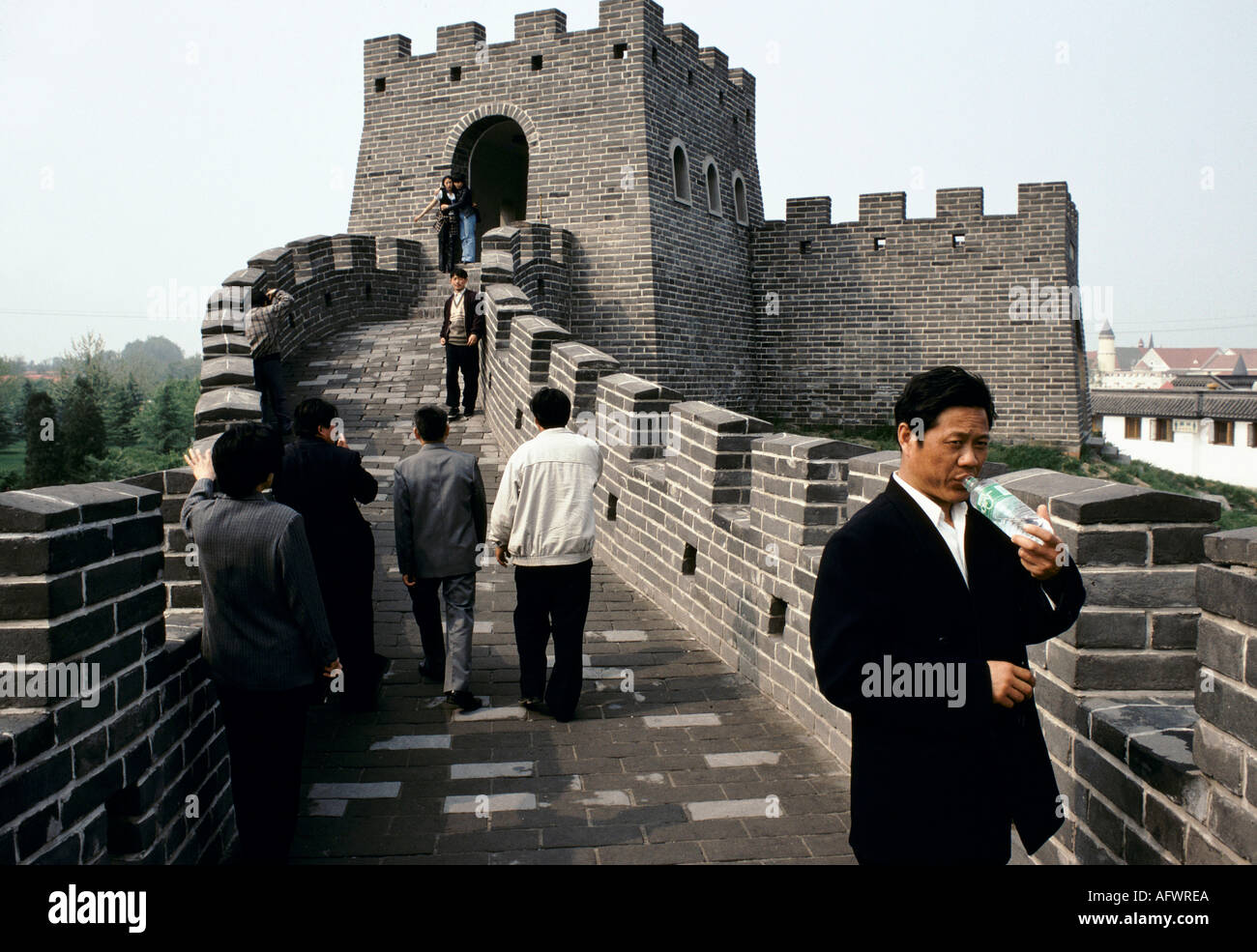 Chinese tourist visits The Great Wall of China, 1990s Beijing theme ...