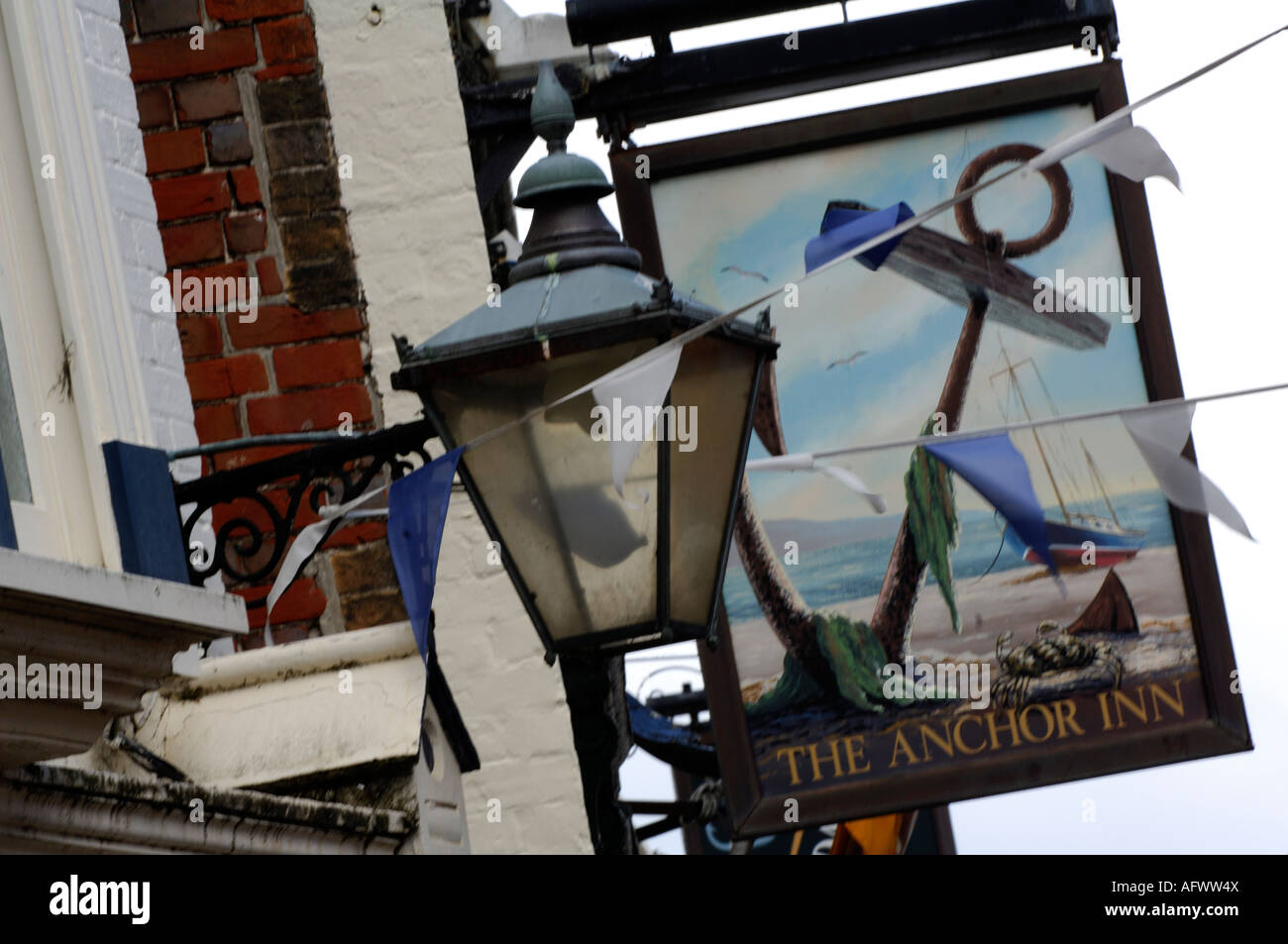 lamp post an the anchor public house sign in cowes high street on tne ...