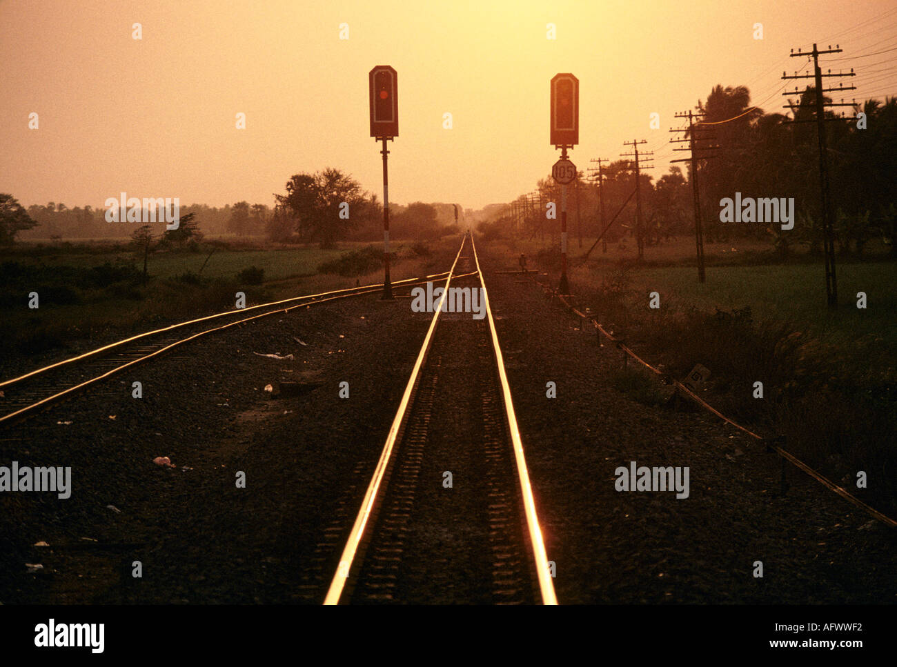 Train journey through Malaysia. Single line track with over taking ...