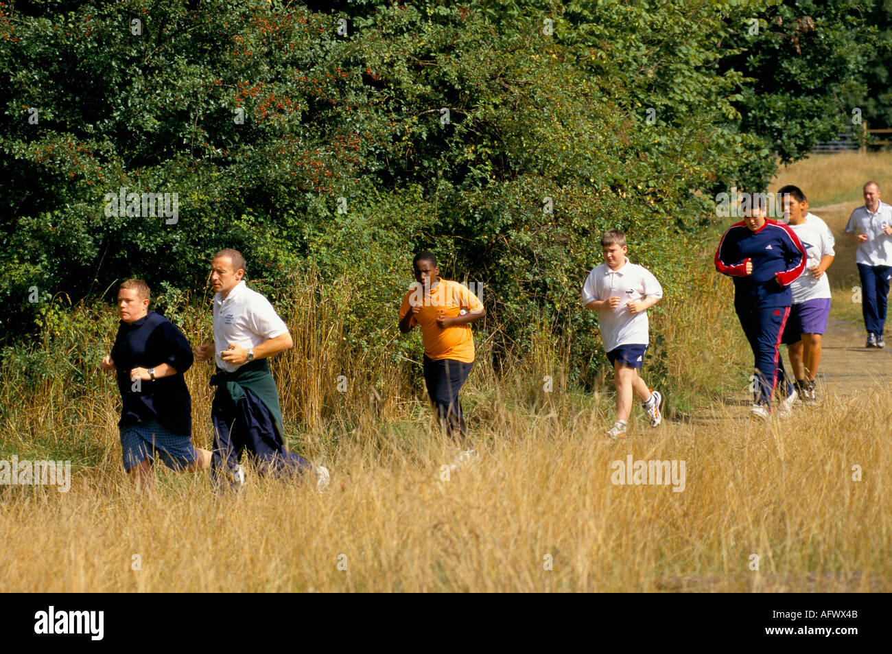 Overweight children, teens at a summer camp for obese teens, everyday ...
