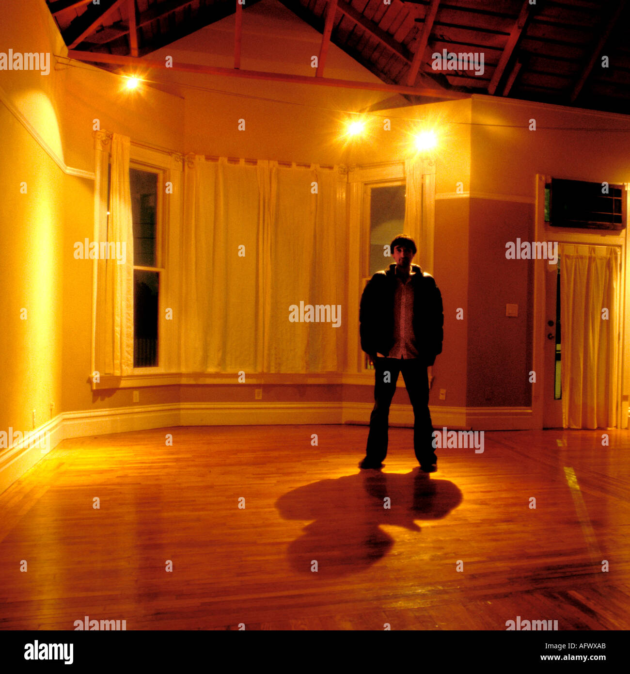 Portraits, Man in an empty house Stock Photo - Alamy