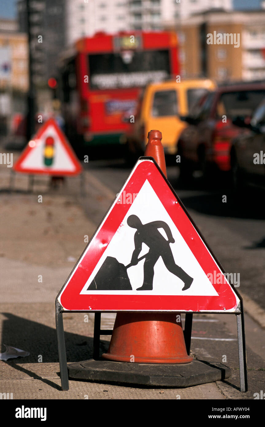 Men at work red triangular road sign, temporary traffic lights sign ...