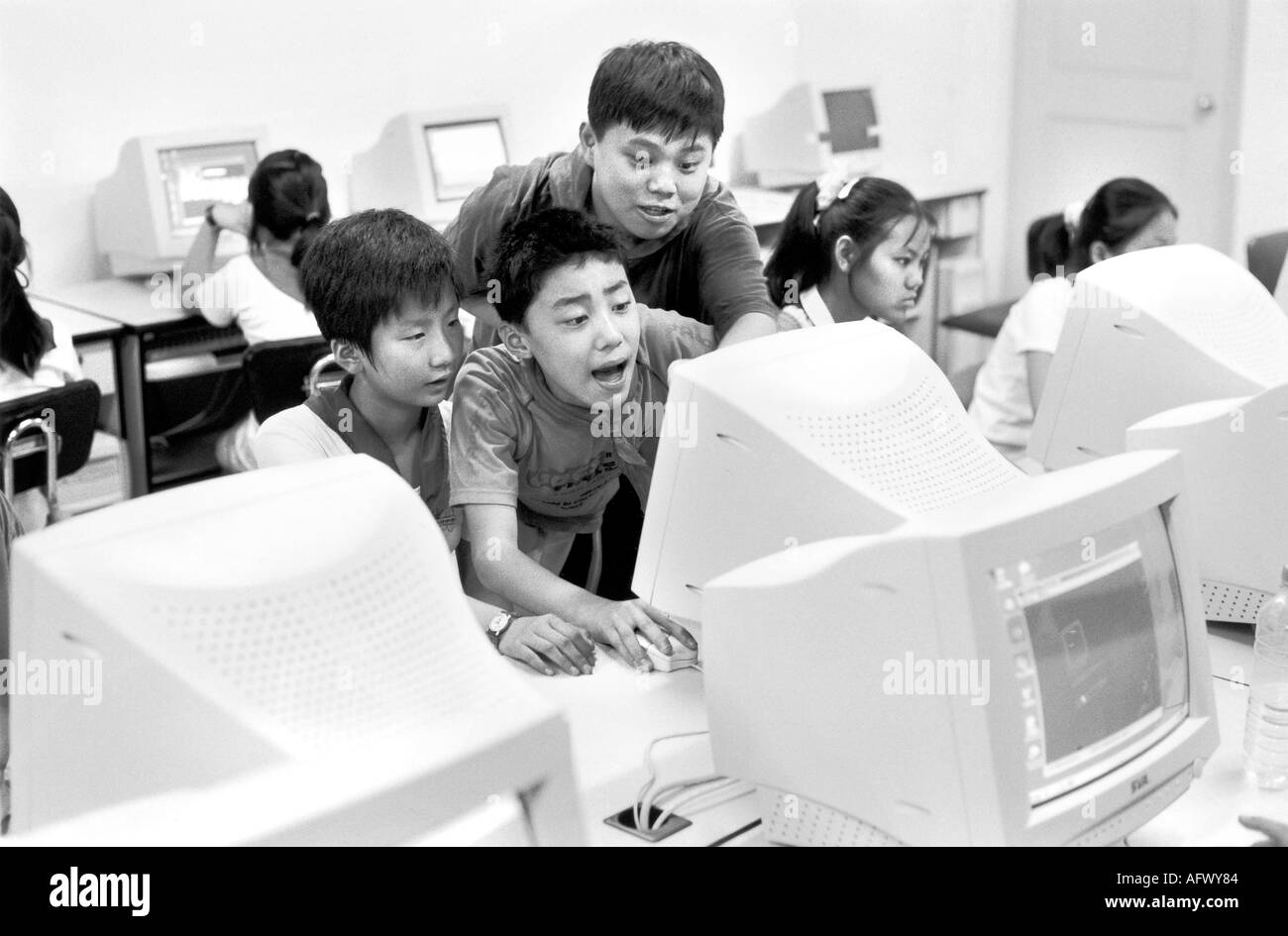 Teen playing computer games Black and White Stock Photos & Images - Alamy