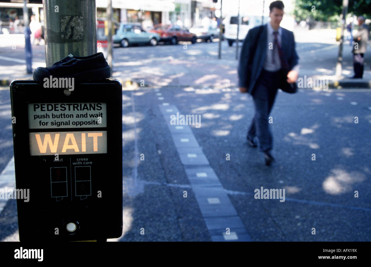 Man crossing road england hi-res stock photography and images - Alamy