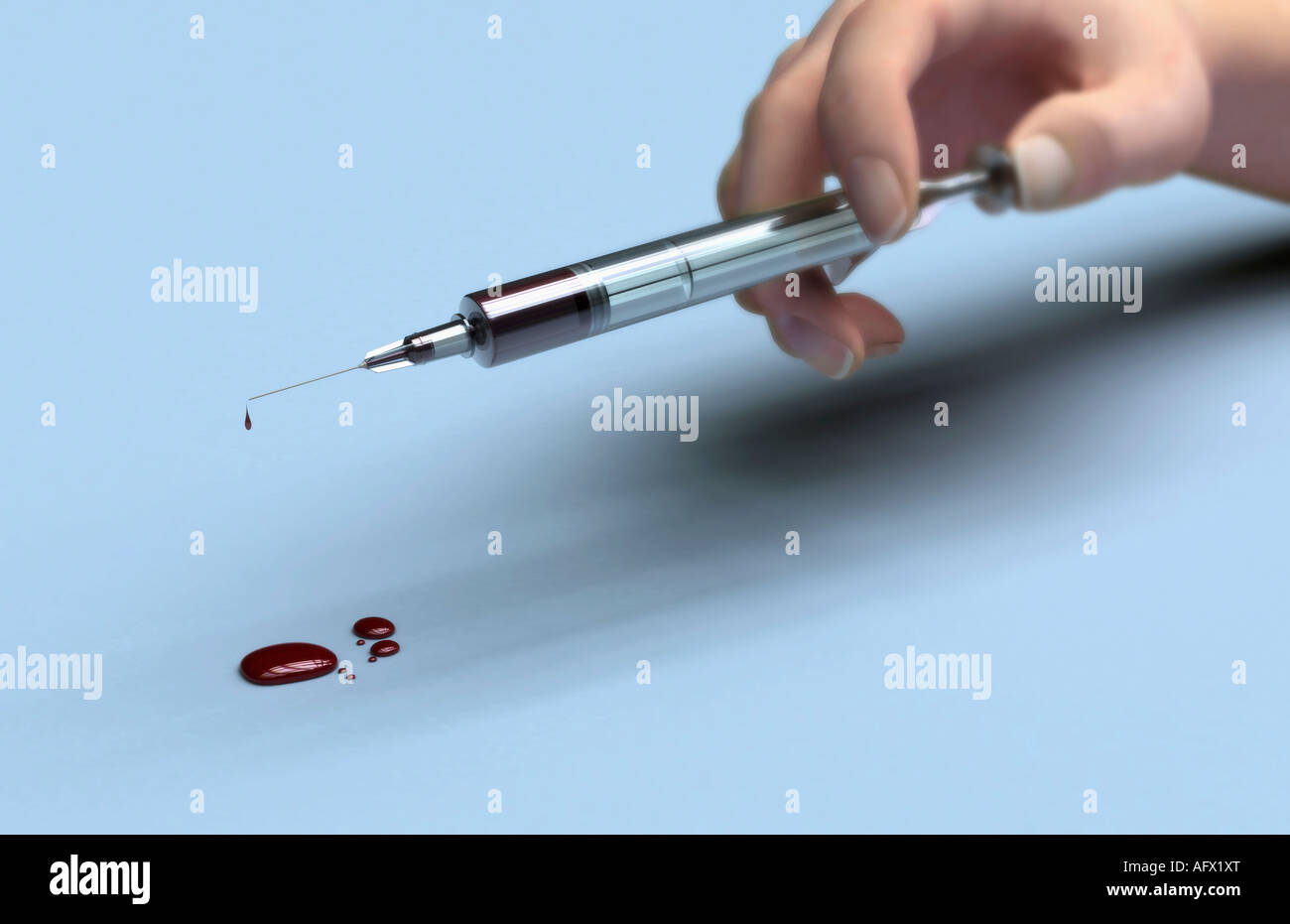 A syringe filled with blood Stock Photo - Alamy