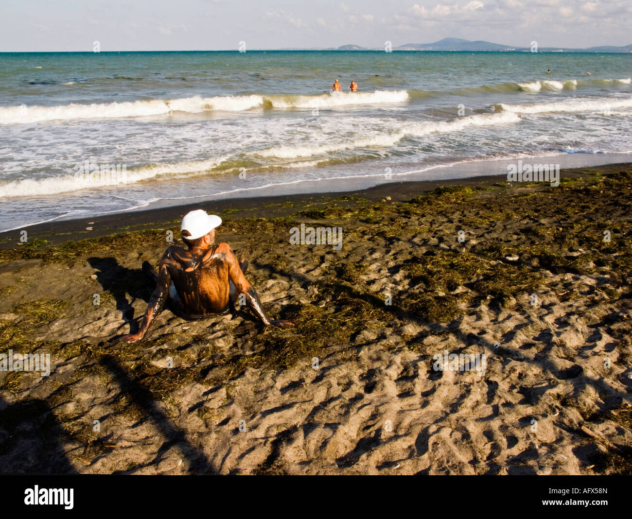 Man covered in black mud hi-res stock photography and images - Alamy