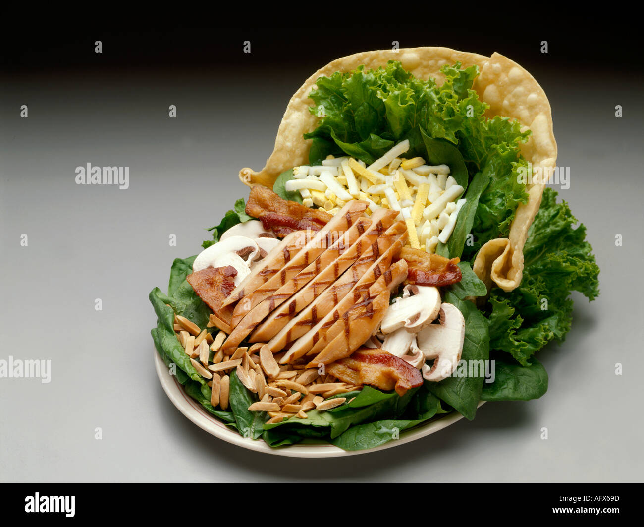 chicken salad on simple background food Stock Photo - Alamy