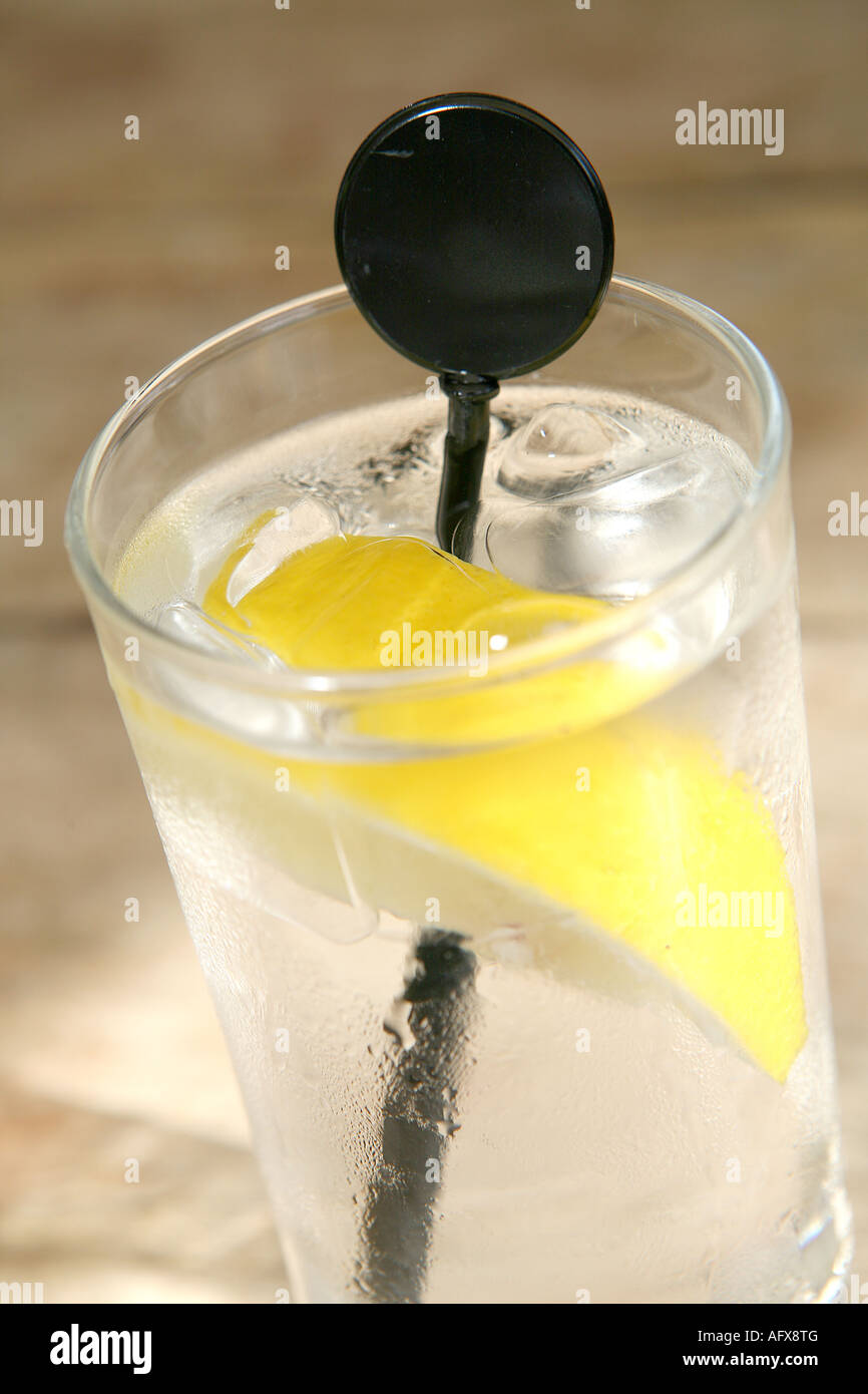 Lemonade With Ice And A Slice Of Lemon Stock Photo - Alamy