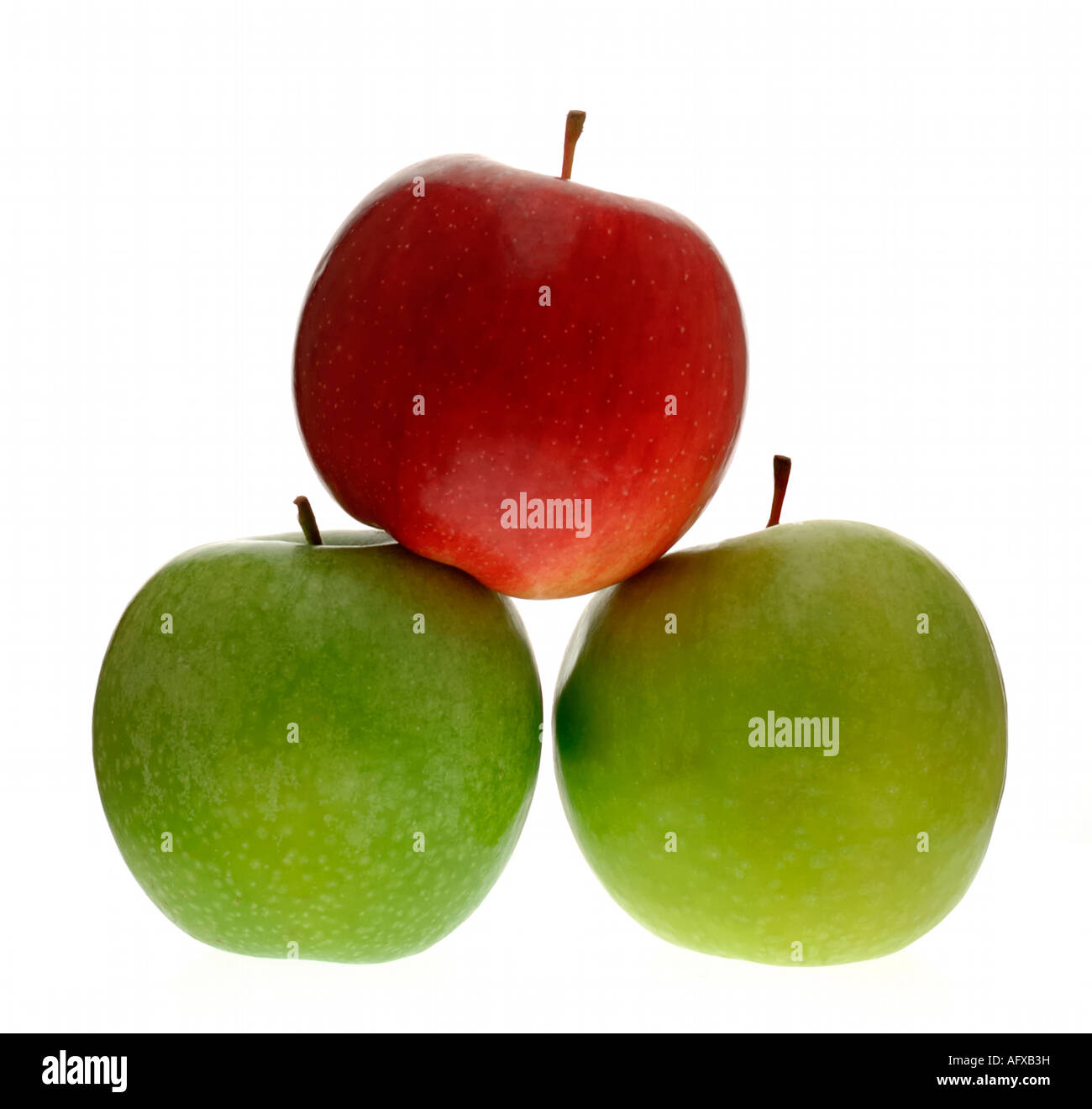 One red apple and two green apples Stock Photo - Alamy