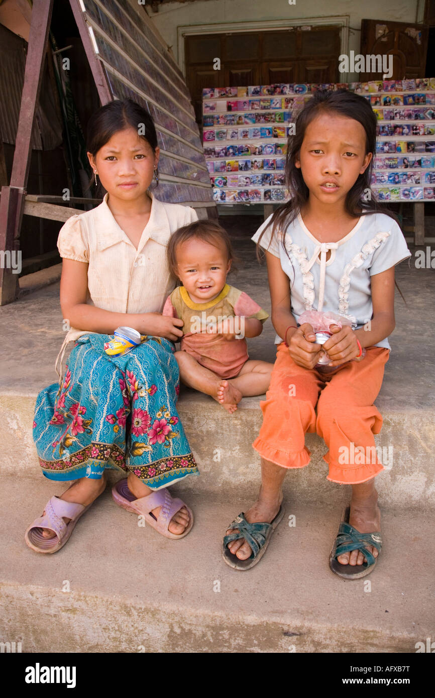 Poor children from Lao village collecting aluminium drink cans at a ...
