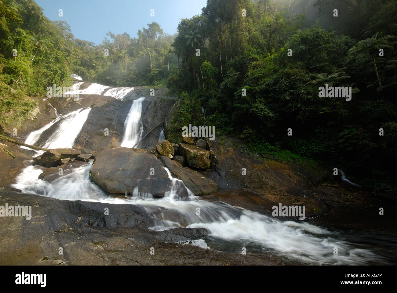 A waterfall in the jungle Stock Photo - Alamy