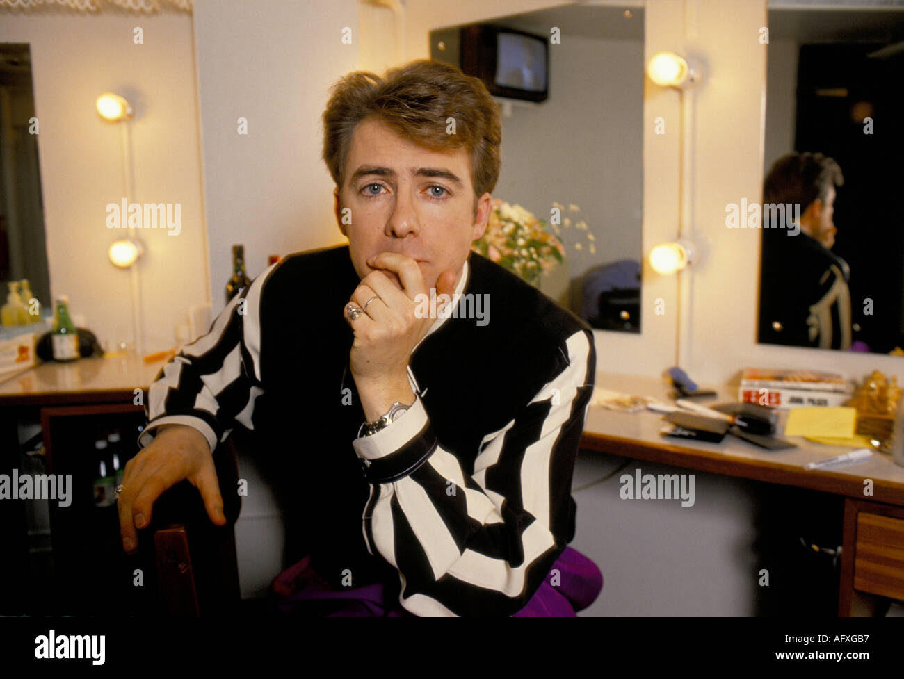Jonathan Ross British TV Radio presenter in dressing room circa 1985 ...
