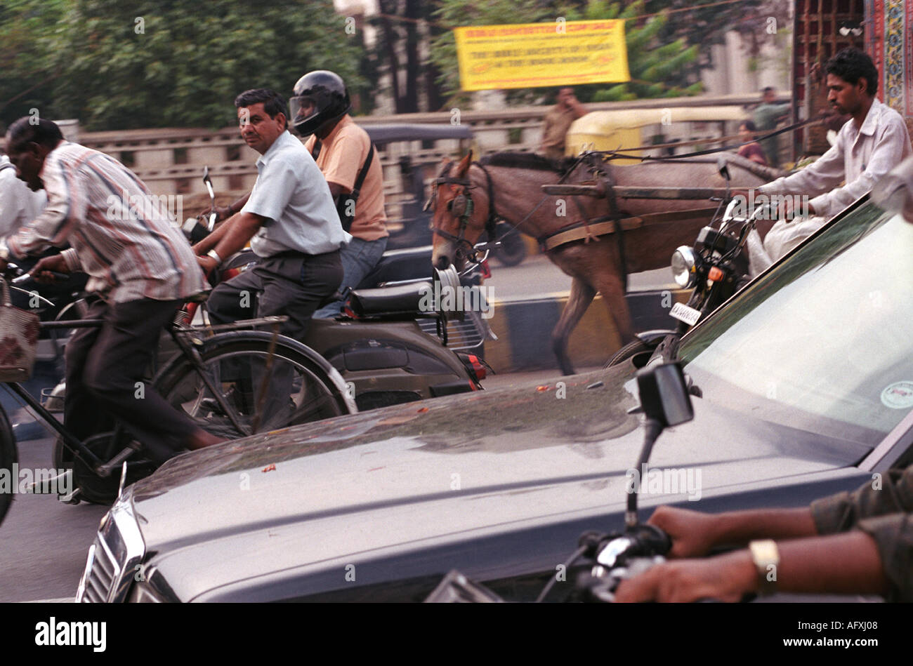 Cars in India amid the traffic chaos The street scene shows different ...