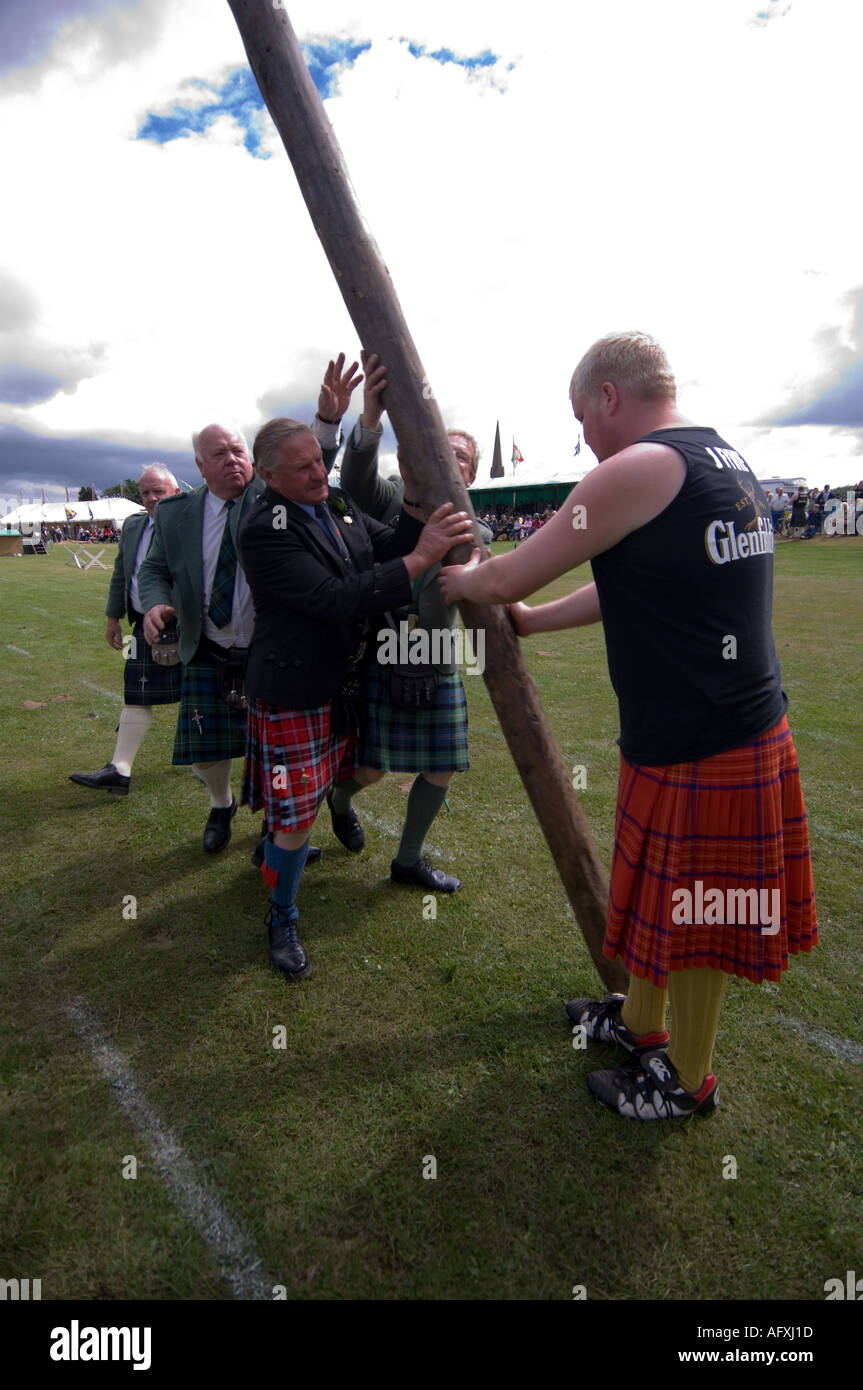 Every time a caber is tossed it has to be retrieved Here the committe ...