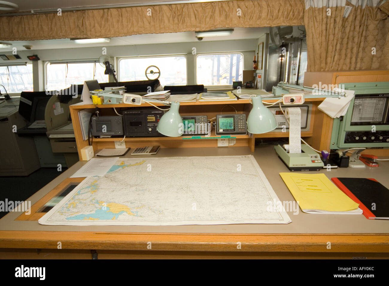 Chart table of container ship with maps of hong kong area and ...