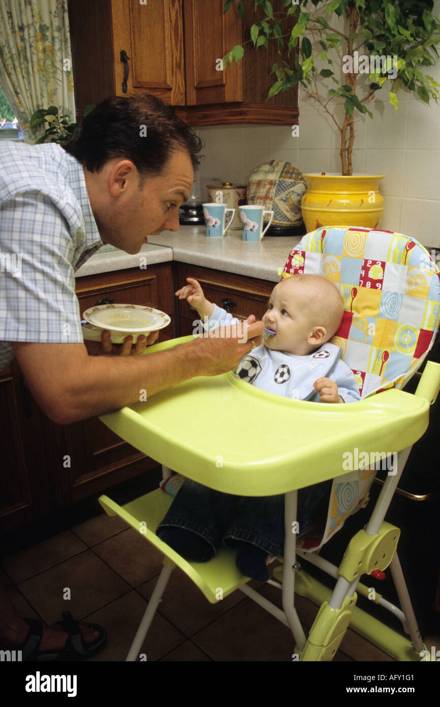 Father Feeding Baby Boy Stock Photo - Alamy