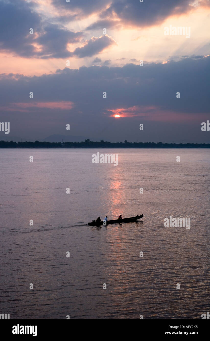 Boat on Mekong River at sunset, Pakse, Laos Stock Photo - Alamy