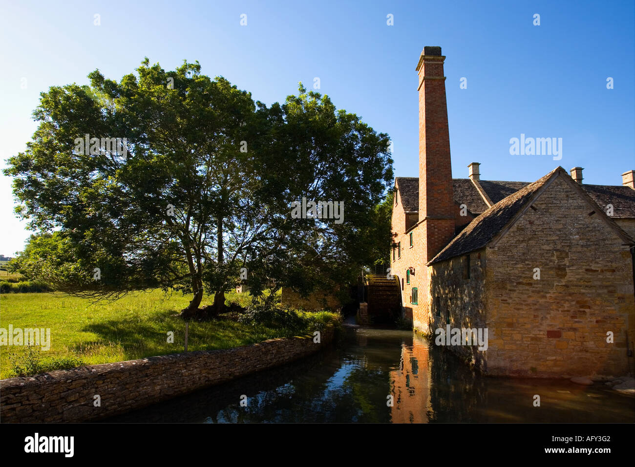 Watermill Water Mill at Lower Slaughter village on the River Coln with ...