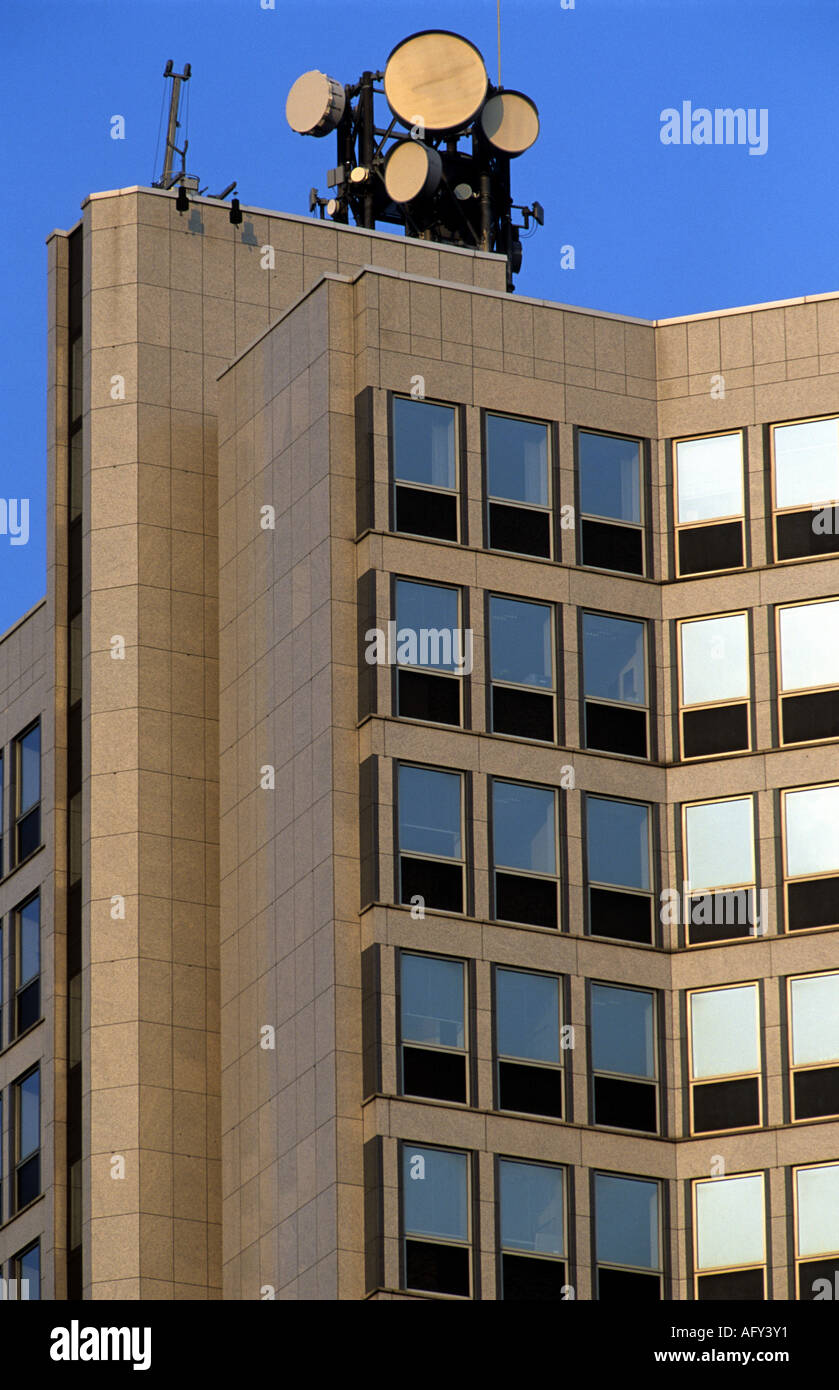 Satellite communication dishes on top of an office block, Essen, North ...