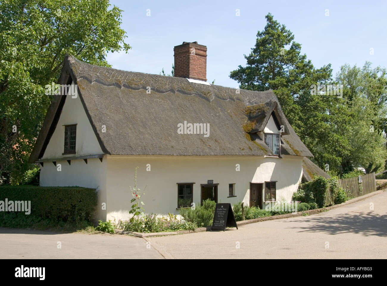 Sixteenth century Bridge Cottage Flatford beside river Stour painted by ...