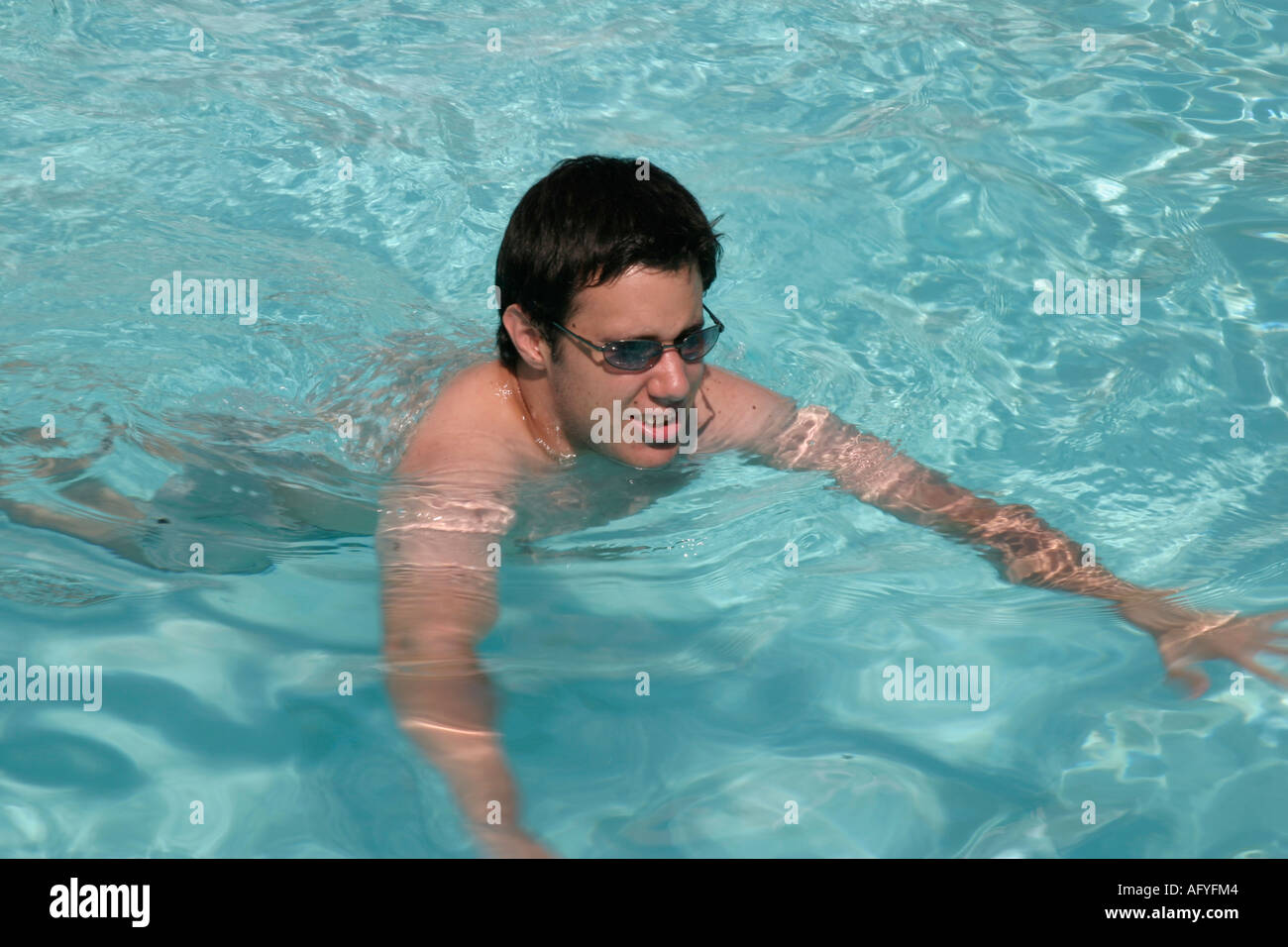 Young Male Swimming in outdoor pool in Gascony France Stock Photo - Alamy