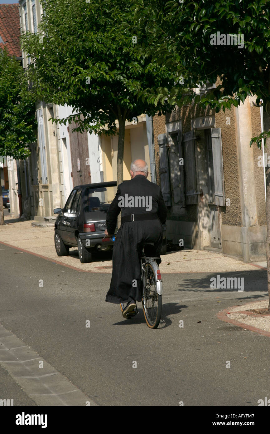 Stock photograph of village priest riding an old bicycle Stock Photo ...
