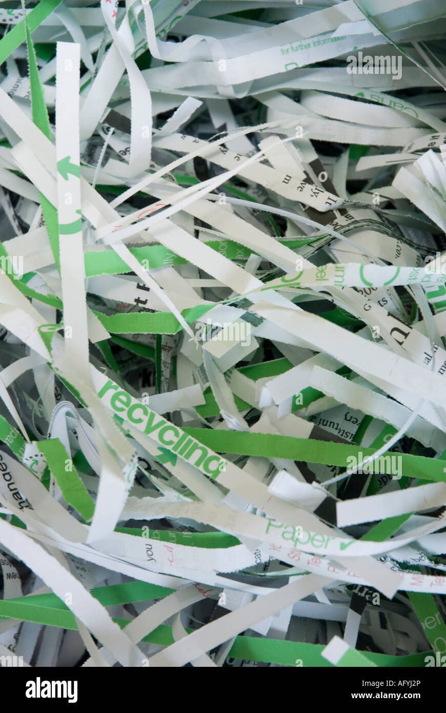Word recycling in shredded paper Stock Photo - Alamy