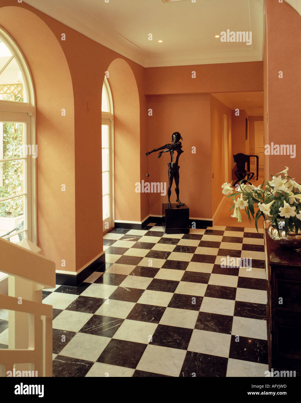 Hallway with Black and White Square Flooring Stock Photo - Alamy