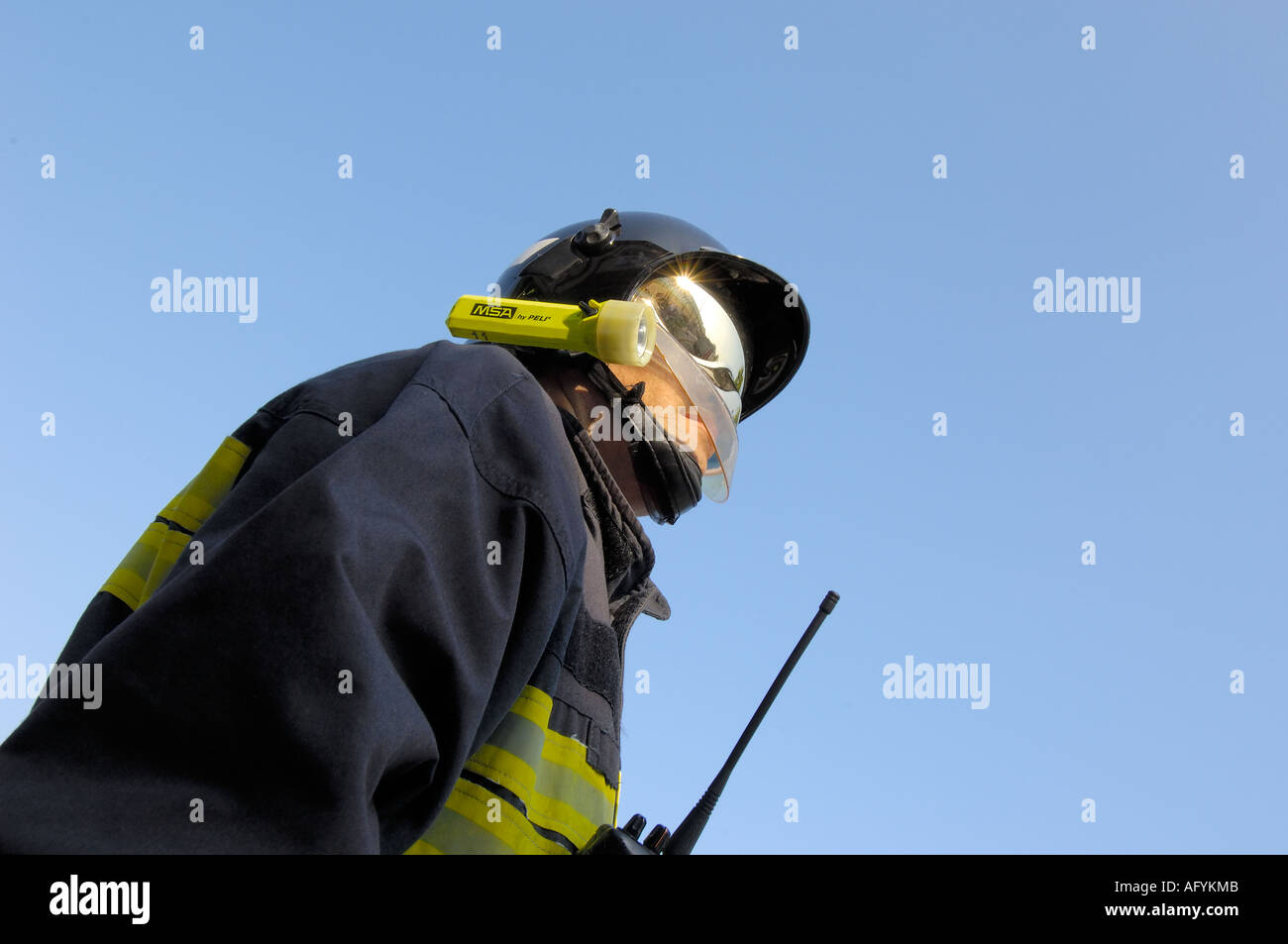 Portrait of a male fire fighter Stock Photo - Alamy