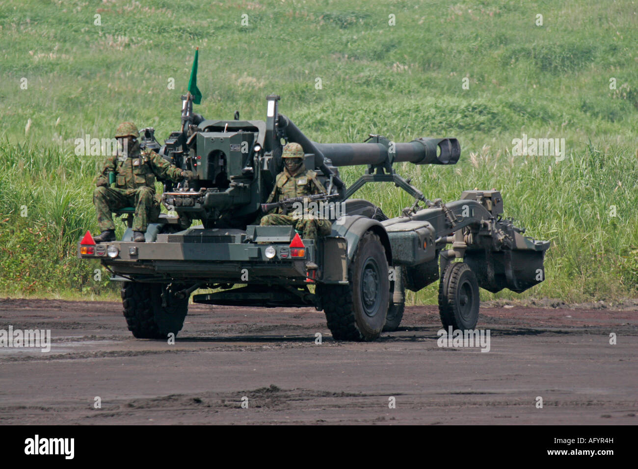 The FH-70 close support gun of Japan Ground Self-Defense Force Stock ...